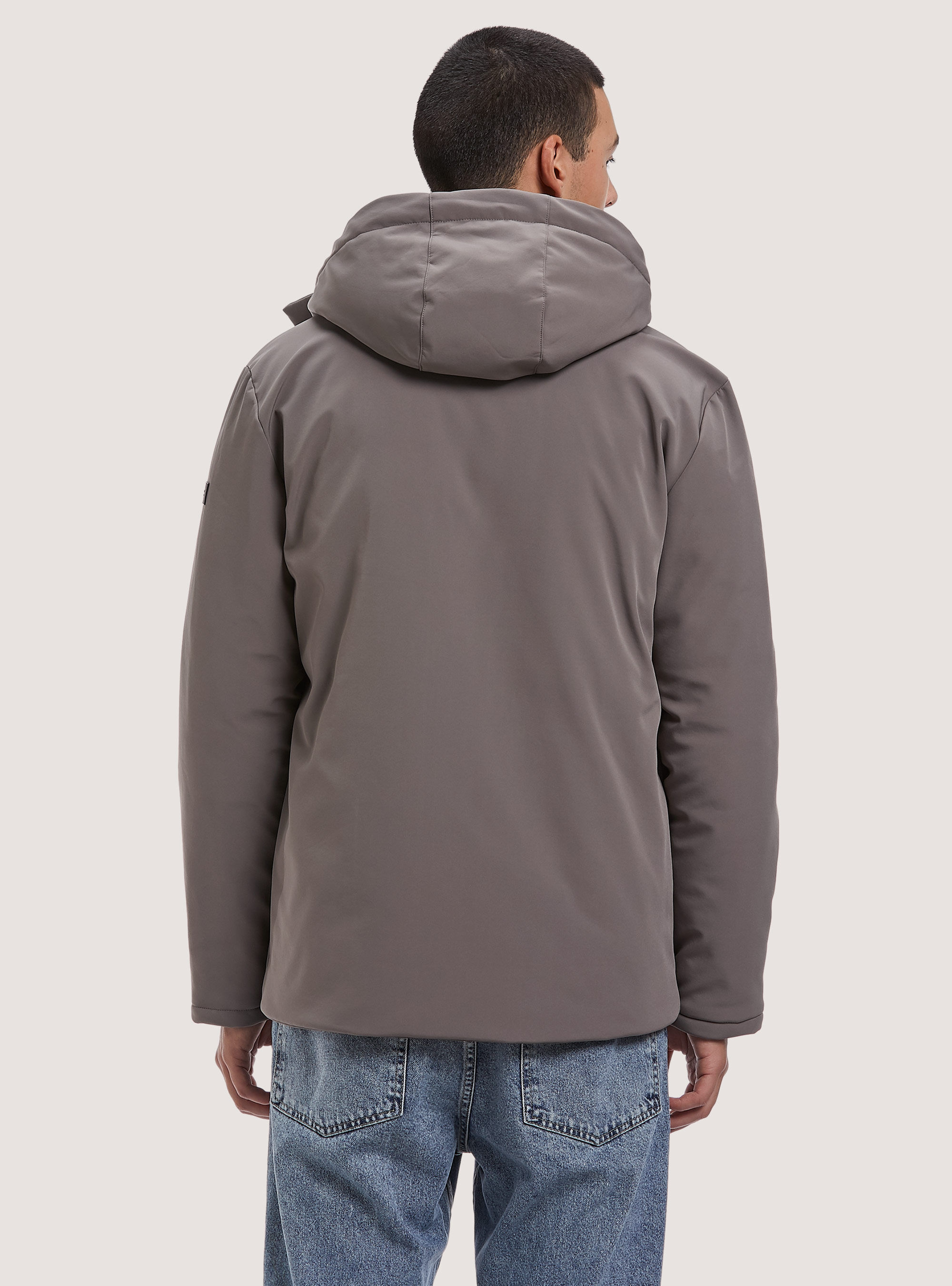 Technical fabric jacket with recycled padding