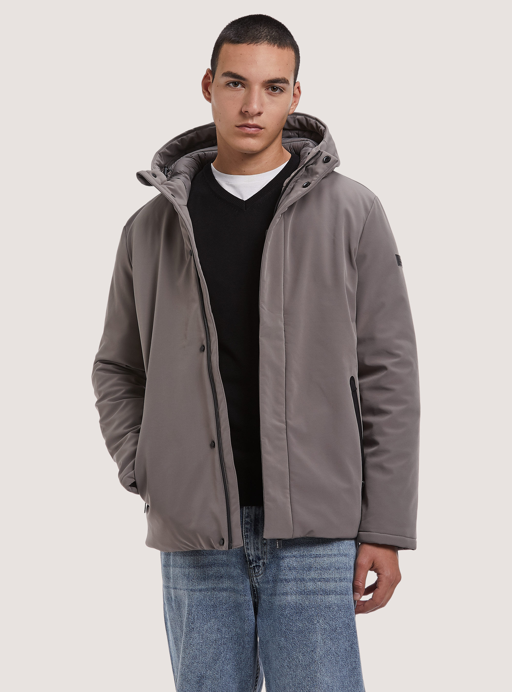 Technical fabric jacket with recycled padding